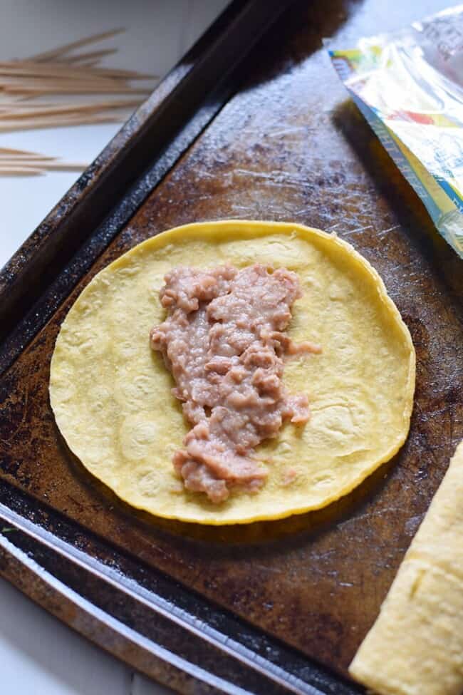 Baked Chicken, Bean & Cheese Taquitos - Isabel Eats